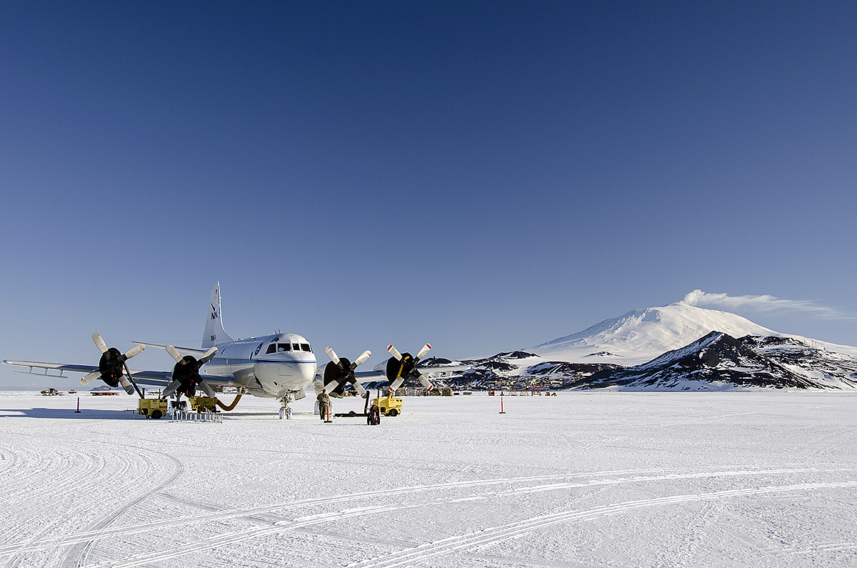 P-3 on the sea ice runway with Mt. Erebus in the background. | NASA ...