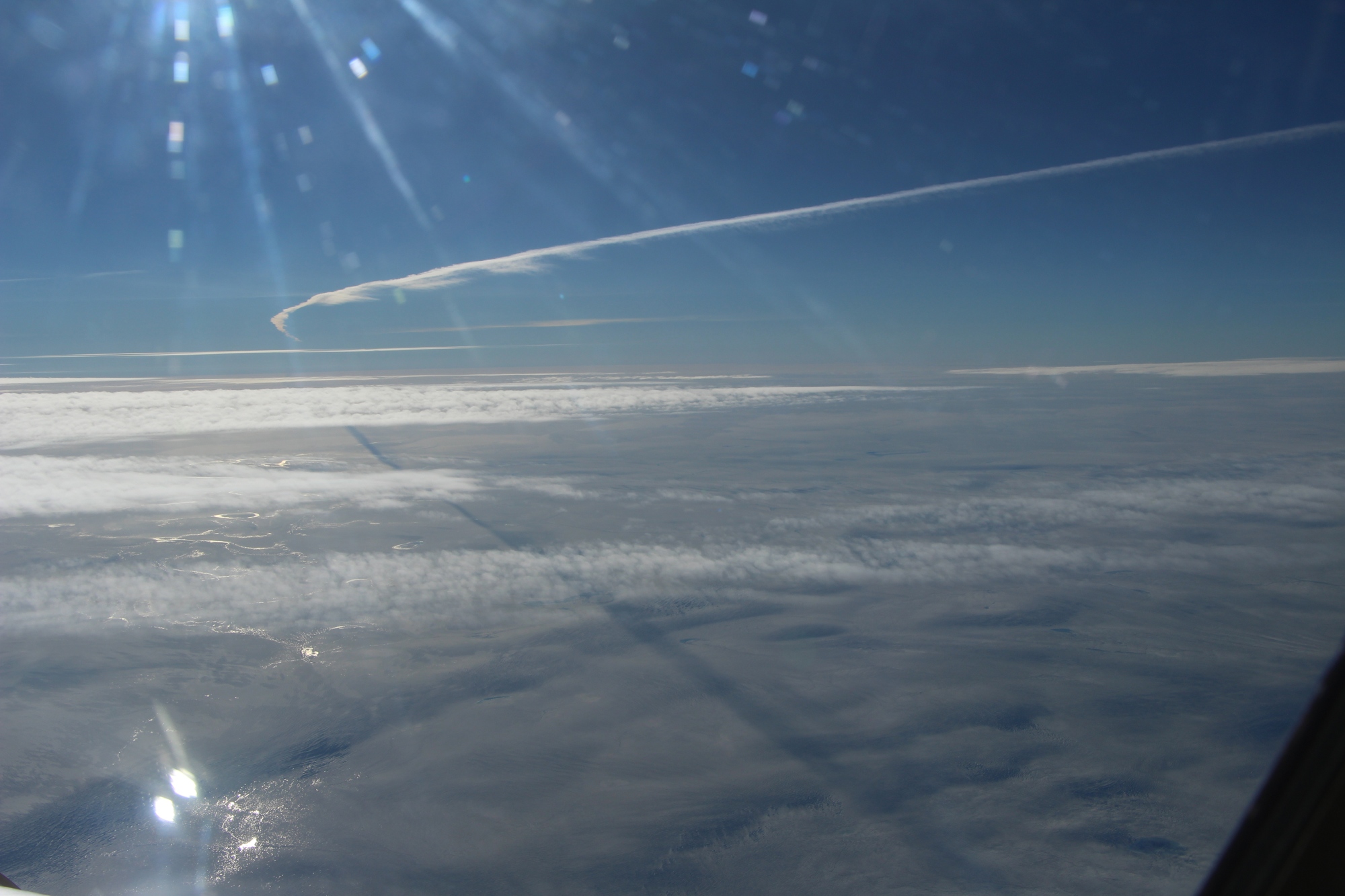 Altostratus and contrail | NASA Airborne Science Program